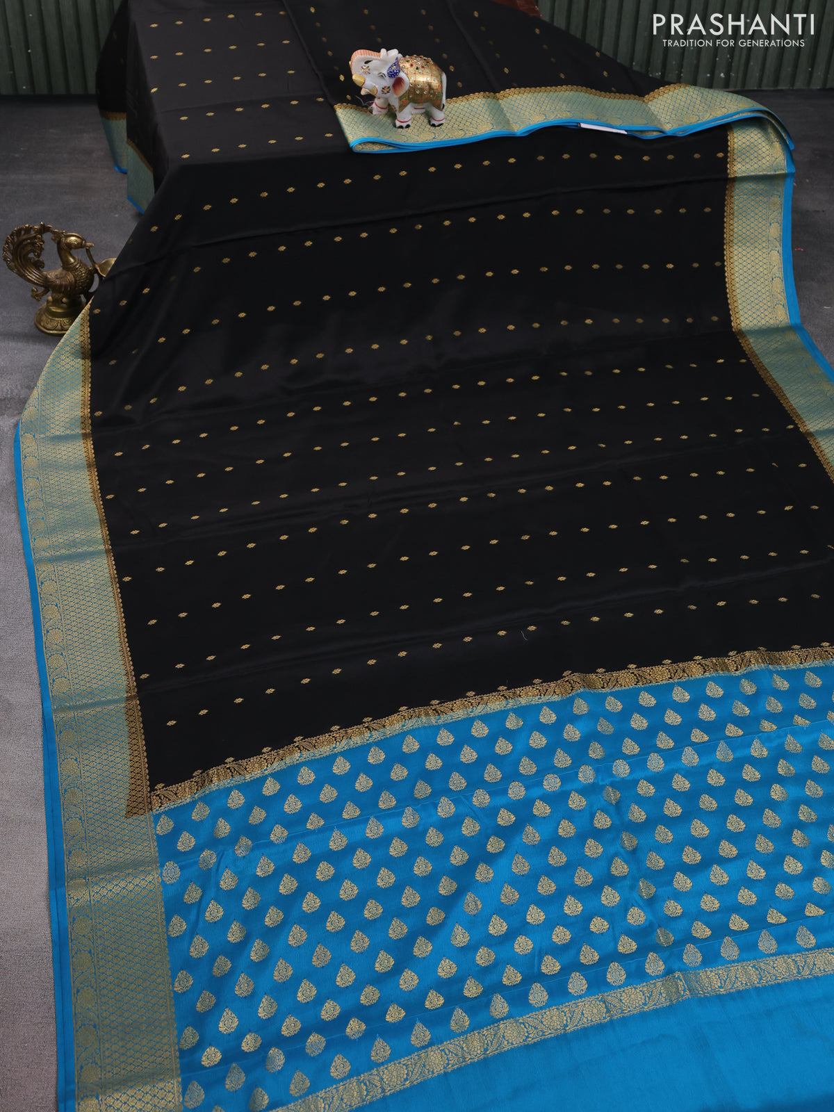 Pure mysore silk saree black and cs blue with allover zari woven butta ...