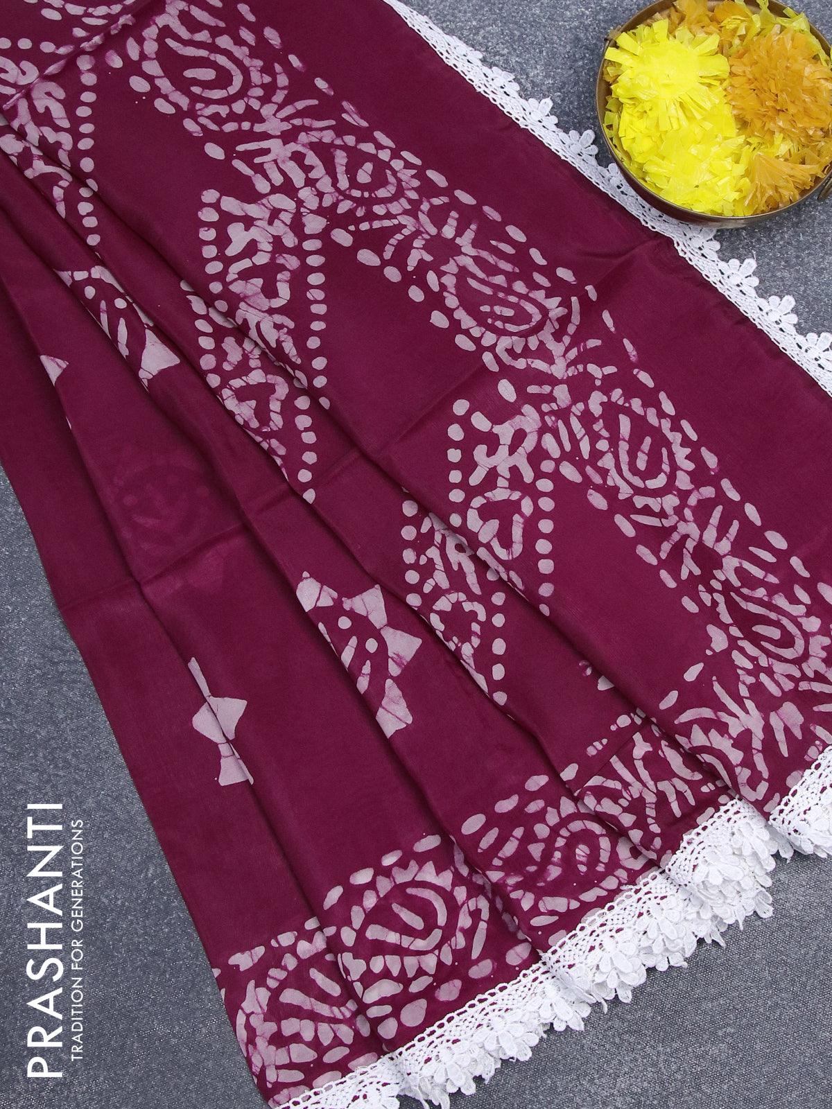 Organza saree maroon with allover batik prints and crocia lace work bo ...